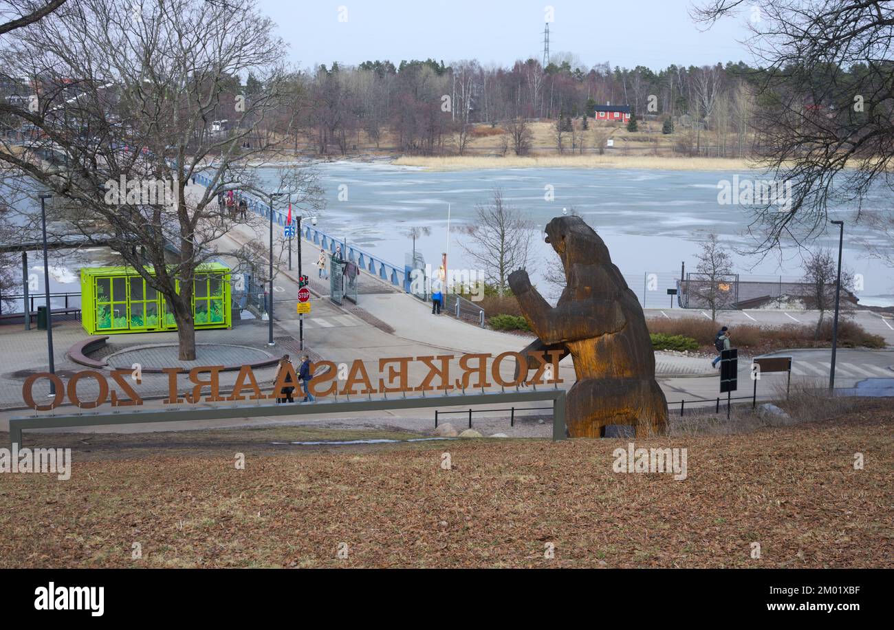 Huge wooden statue of bear at the main entrance to Korkesaari zoo in ...