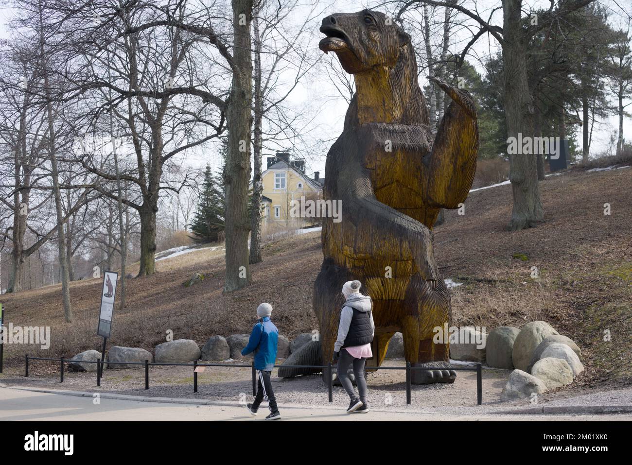 Huge wooden statue of bear at the main entrance to Korkesaari zoo in ...