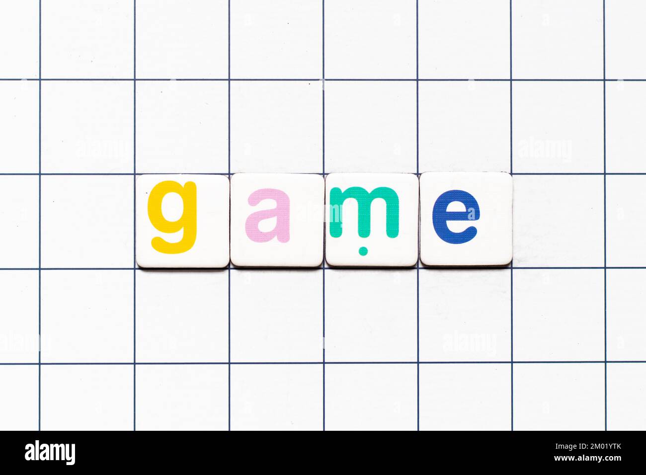 Colorful tile letter in word game on white grid background Stock Photo ...