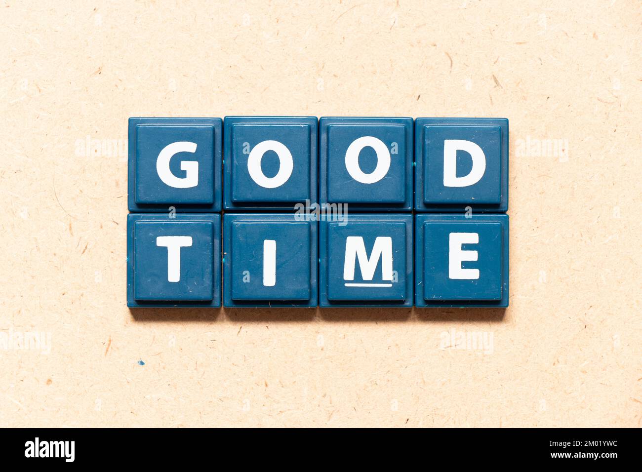 Tile letter in english word good time on wood background Stock Photo ...