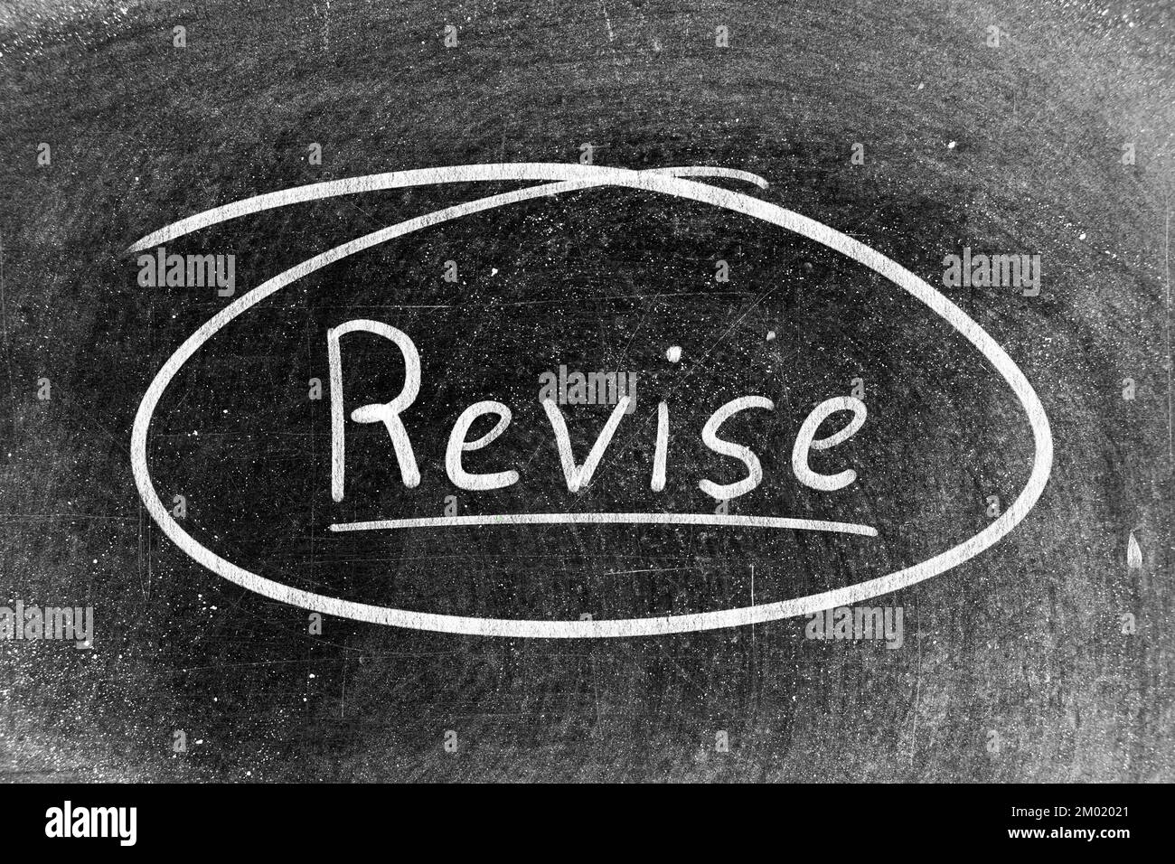 White chalk hand writing in word revise on blackboard background Stock ...