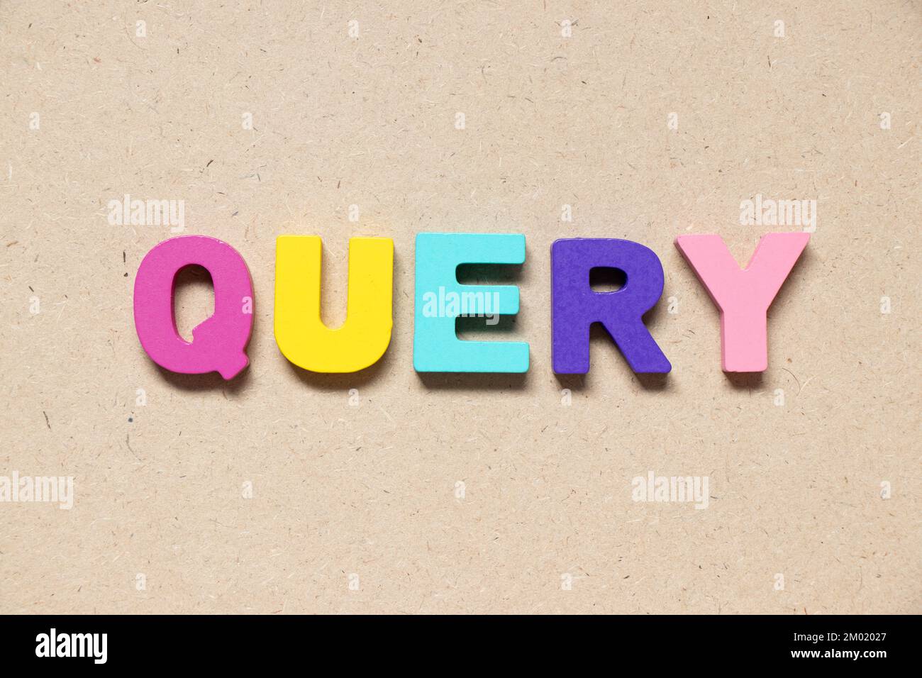 Color alphabet letter in word query aon wood background Stock Photo - Alamy