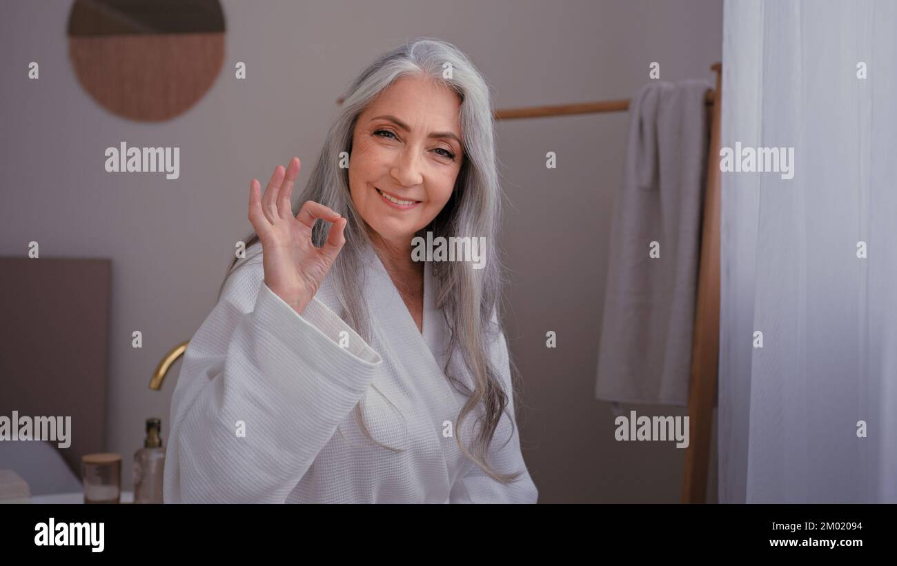 Happy senior mature lady Caucasian old woman female in bathrobe in ...