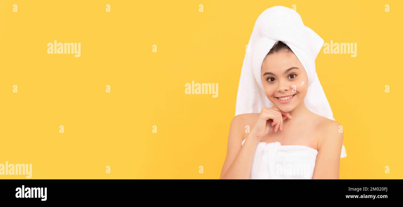 Clean skin care of teenager girl, glad teen girl in shower towel with ...