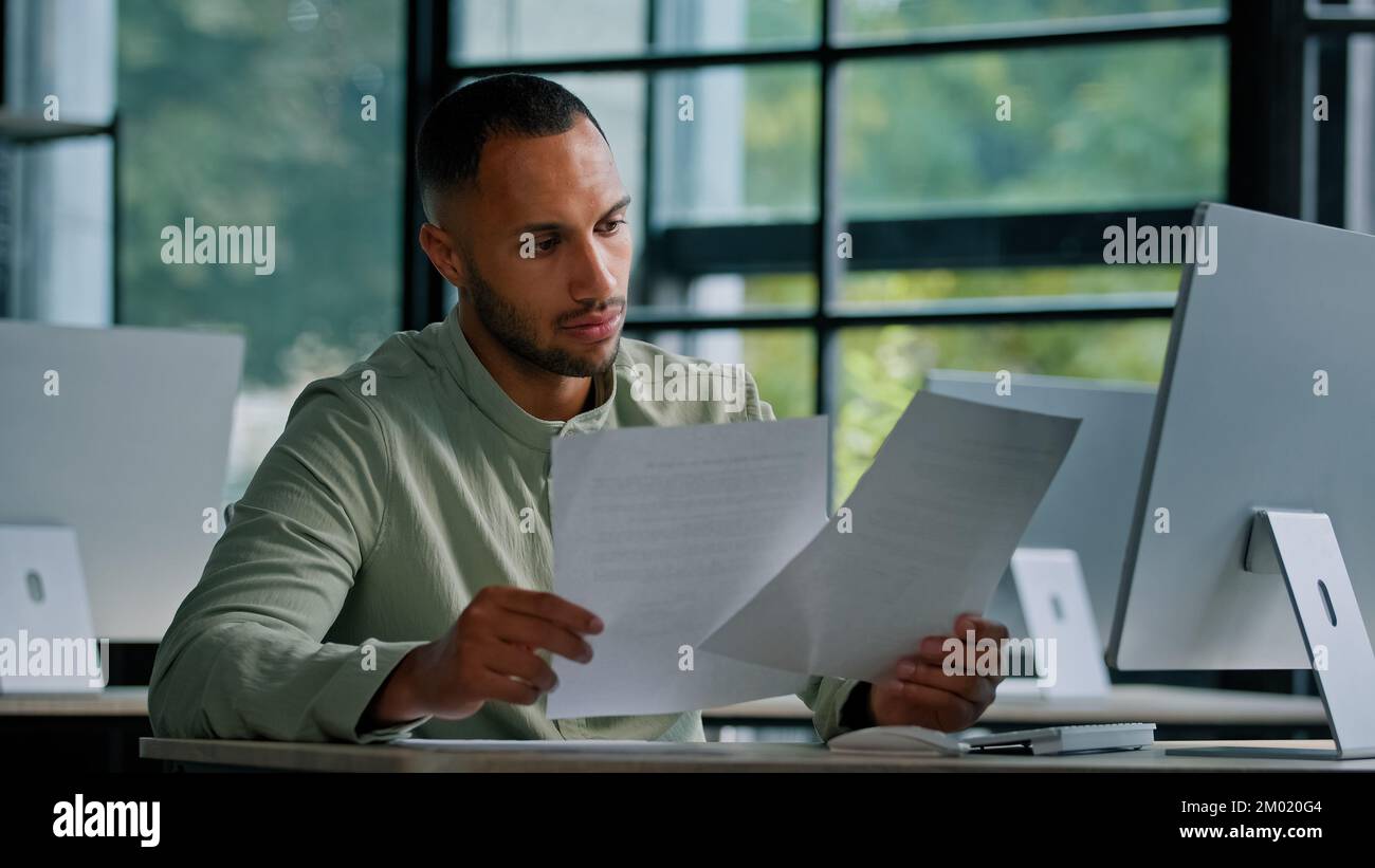 Pensive leader company CEO thinking African businessman boss auditor ...