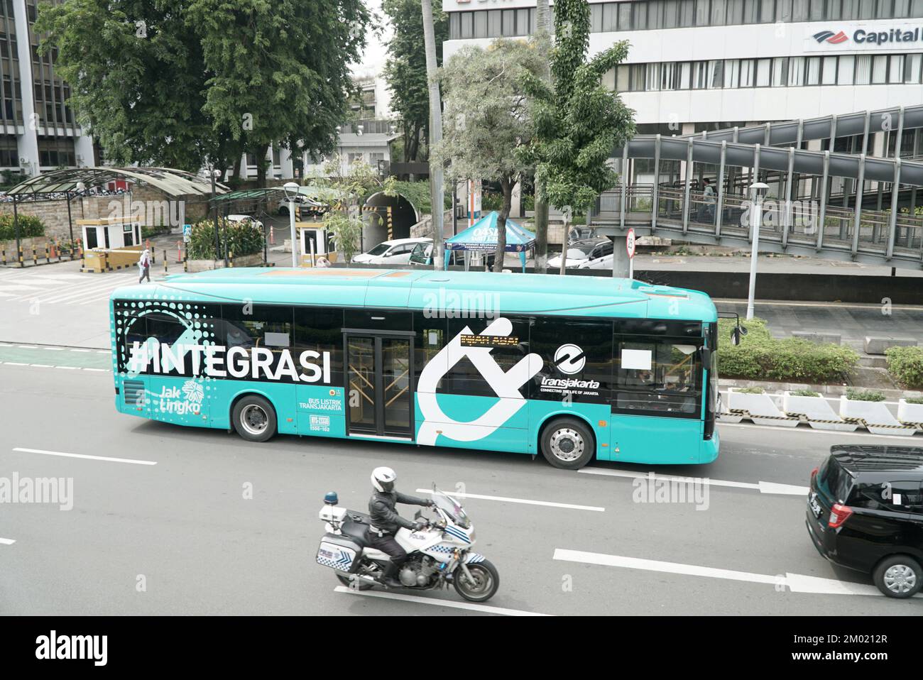 Trans Jakarta integration bus drive with Electric bus, on the Sudirman ...
