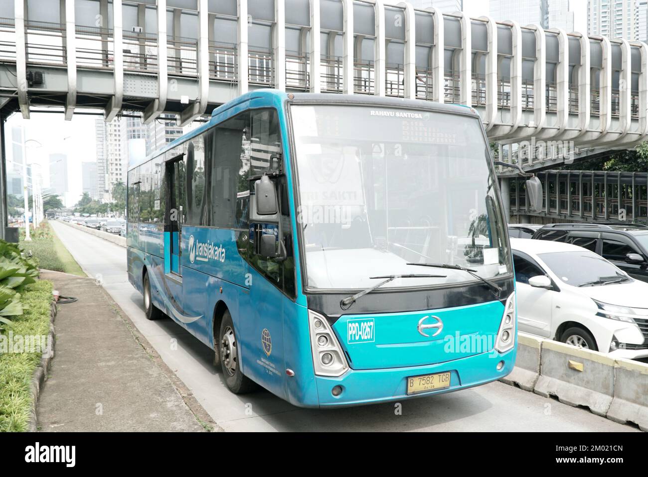 Trans Jakarta bus in bus way line, at the rush hour traffic. Location ...