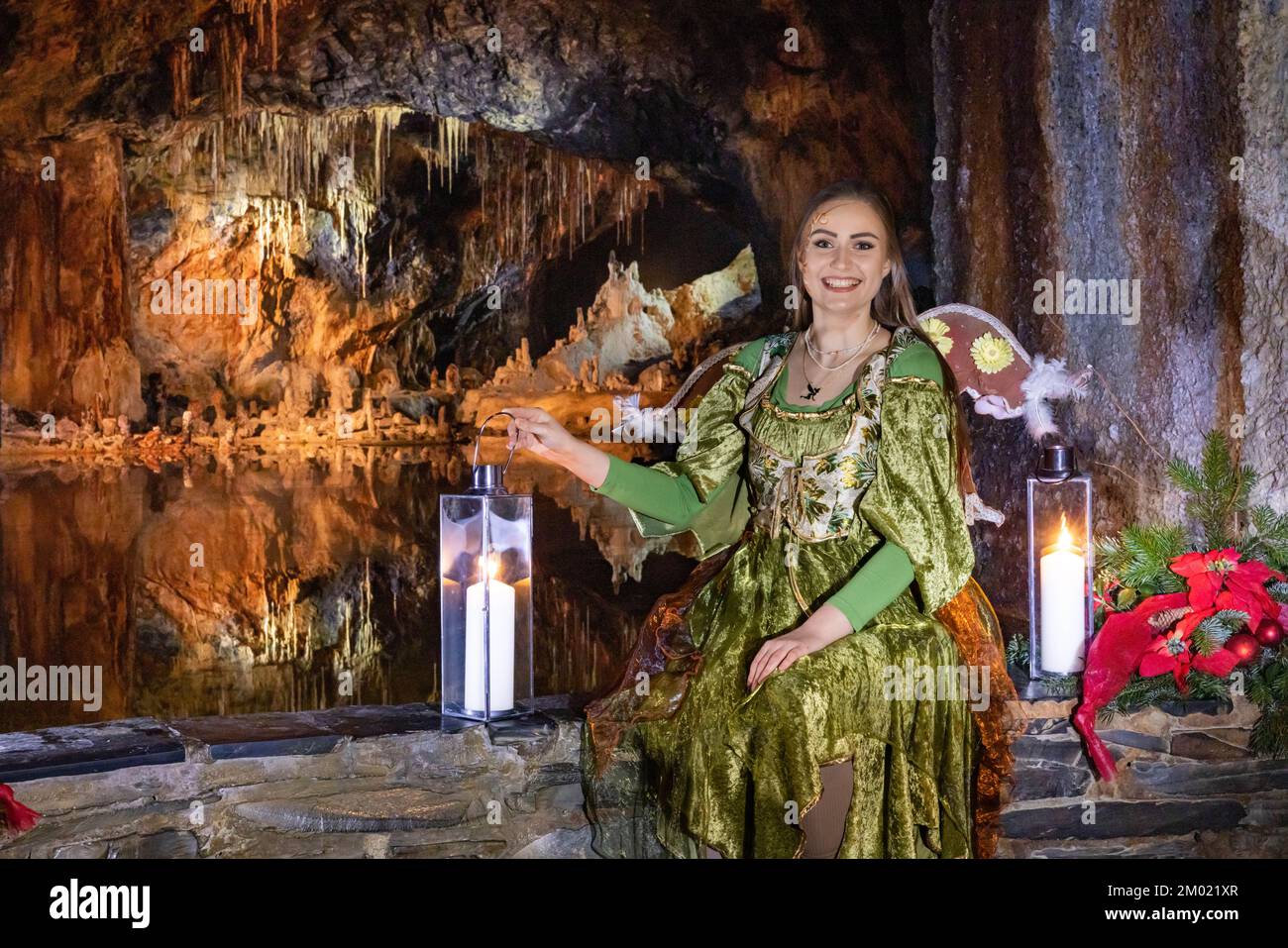 Saalfeld, Germany. 03rd Dec, 2022. Forest fairy Nathalie Forbriger sits ...