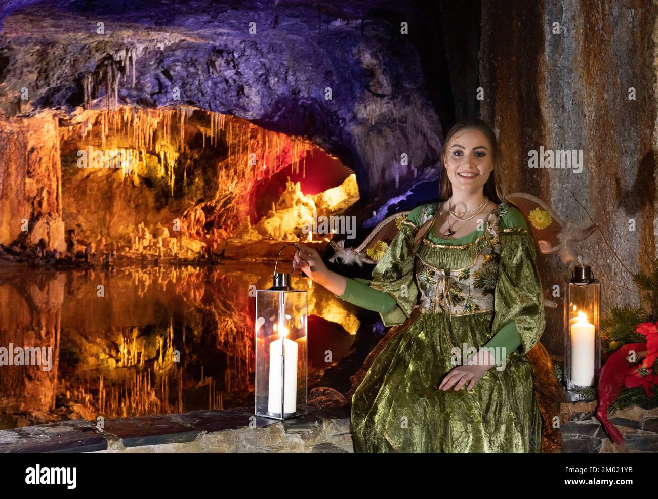 Saalfeld, Germany. 03rd Dec, 2022. Forest fairy Nathalie Forbriger sits ...