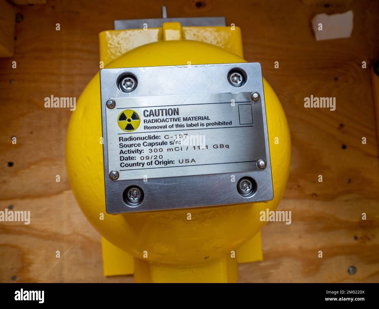 Radiation warning sign on the nameplate the mechanical container of ...