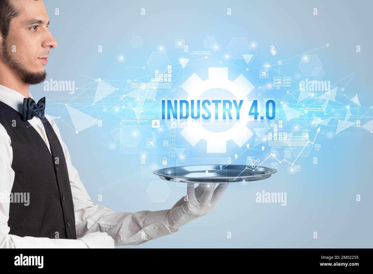 Waiter serving new technology concept Stock Photo - Alamy