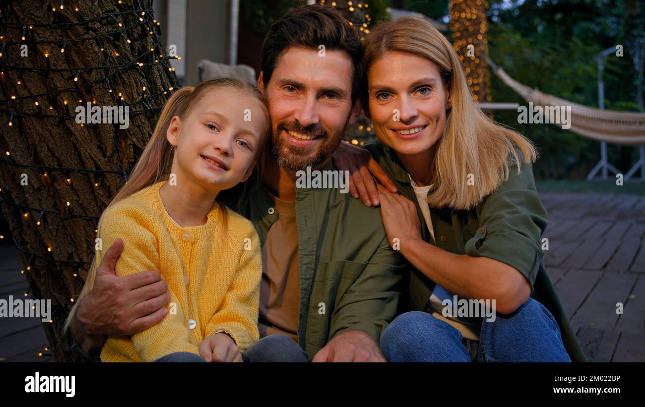 Close up happy smiling faces Caucasian family portrait outdoors in ...