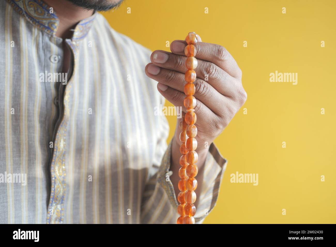 muslim man keep hand in praying gestures during ramadan, Close up Stock ...