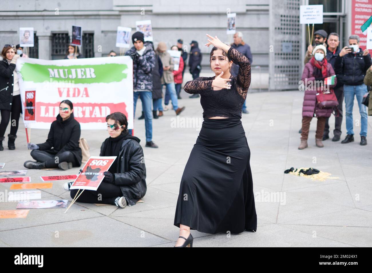 Artist Erika Suarez performs during a protest to demand freedom in Iran ...