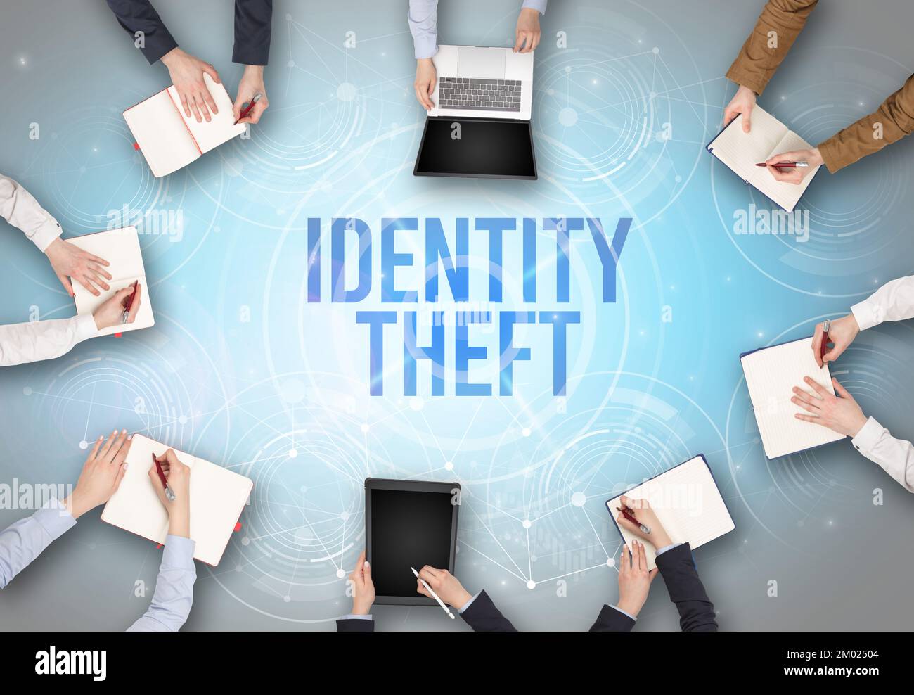 Group of people in front of a laptop, security concept Stock Photo - Alamy