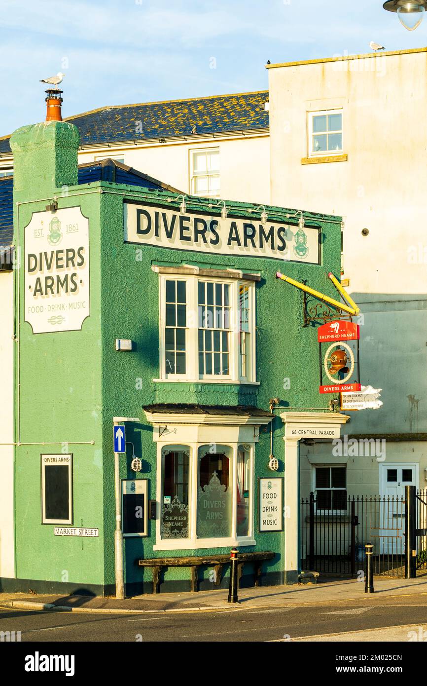 Typical British pub. The front of Green painted 'Divers Arms' on the ...