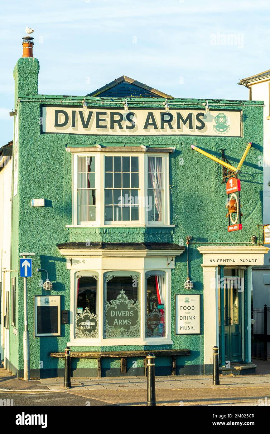 Typical British pub. The front of Green painted 'Divers Arms' on the ...