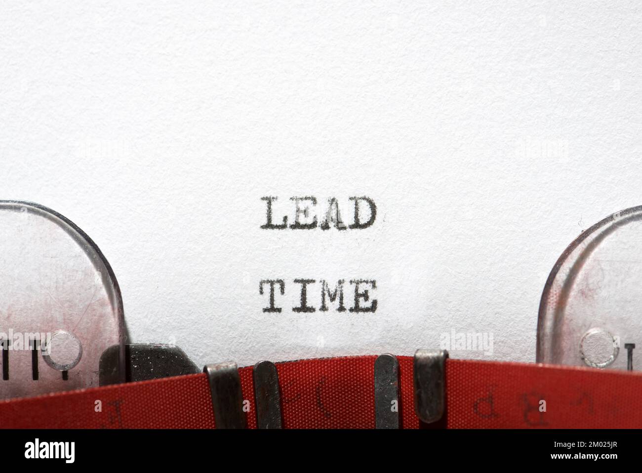 Lead time phrase written with a typewriter Stock Photo - Alamy