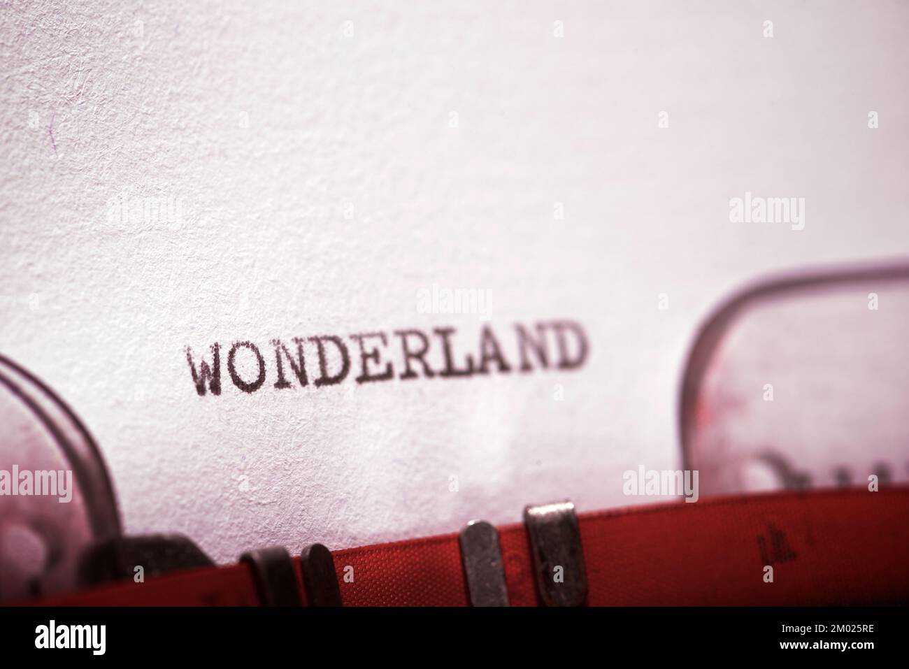 Wonderland word written with a typewriter Stock Photo - Alamy