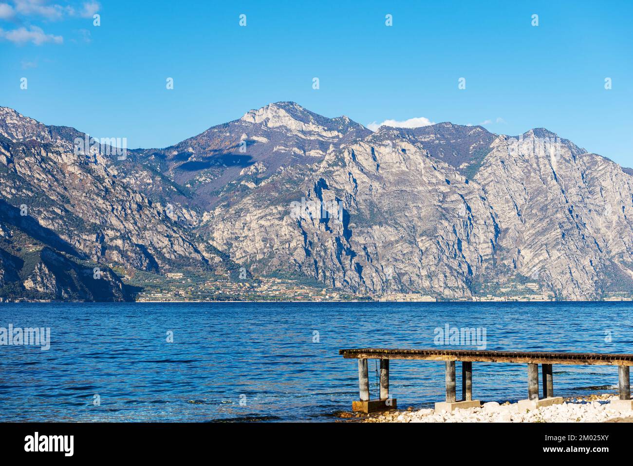 Lake Garda (Lago di Garda) and Italian Alps with the small village of ...