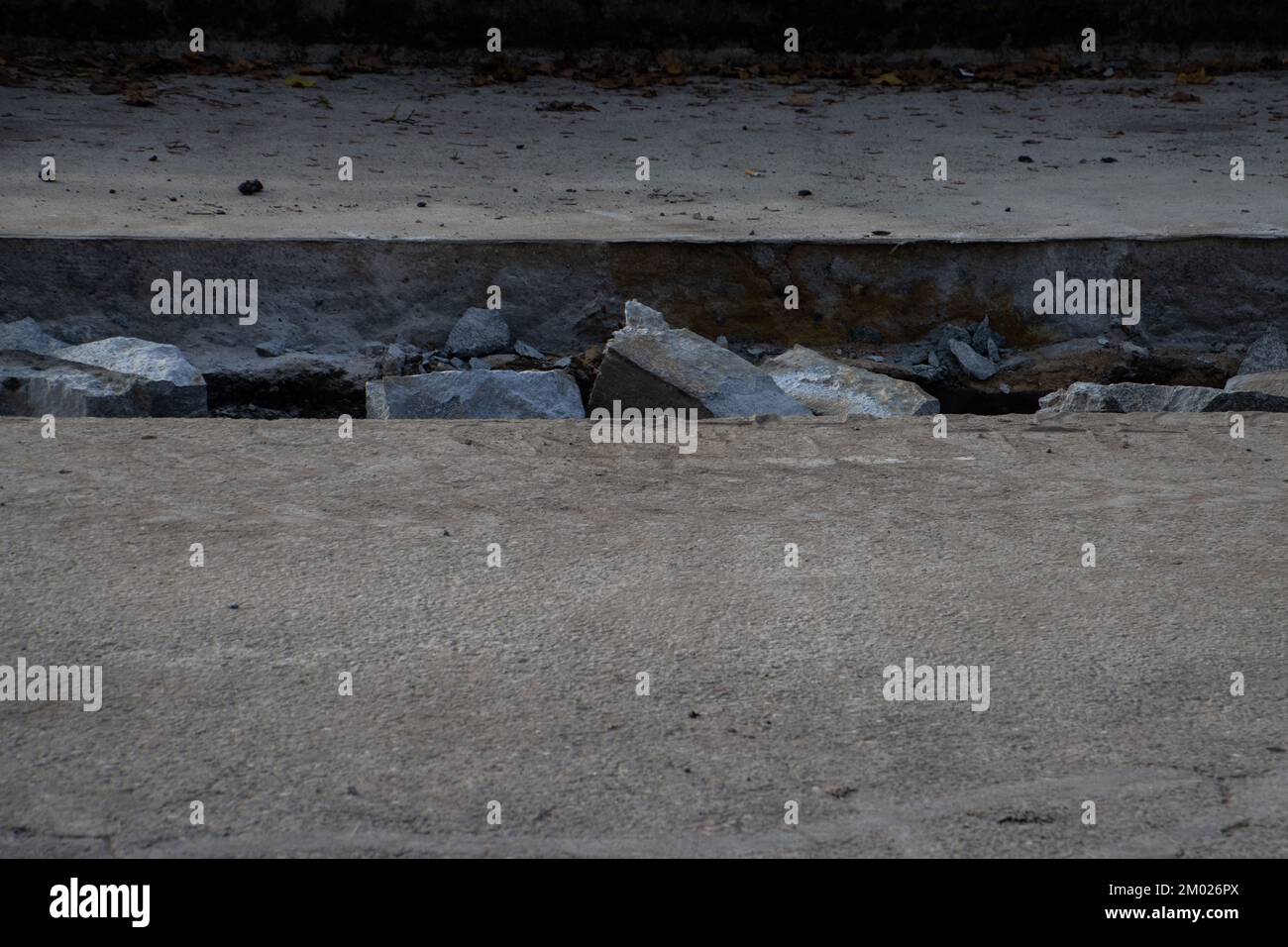 Concrete rubble in a ditch on a construction site Stock Photo - Alamy
