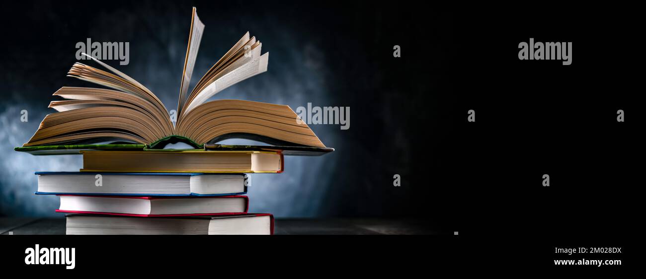 Open book lying hi-res stock photography and images - Alamy