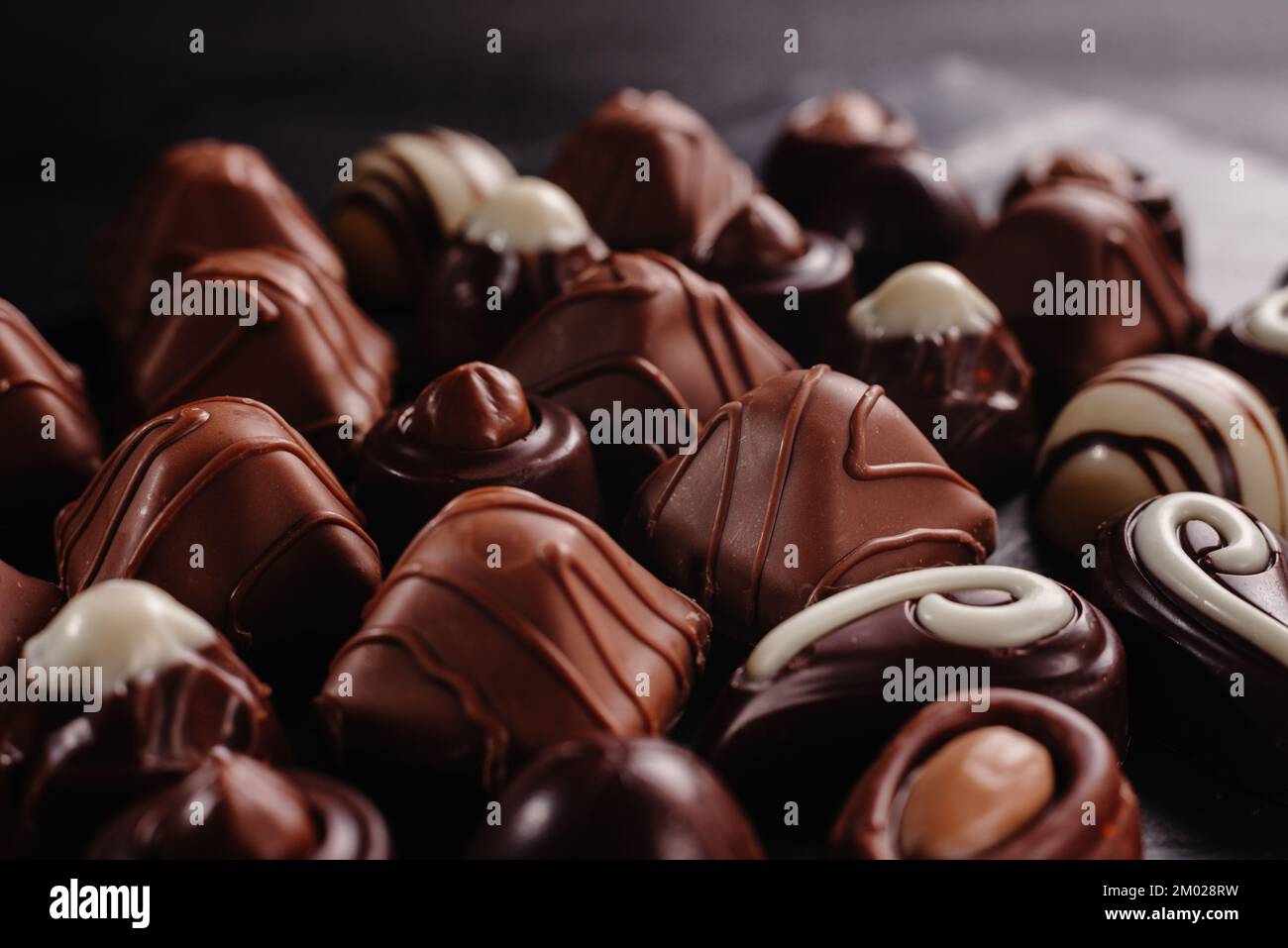 chocolate candies with different tasty, sweet food background Stock ...