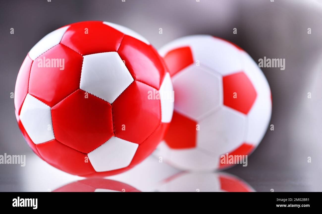 Composition with two leather soccer balls Stock Photo - Alamy