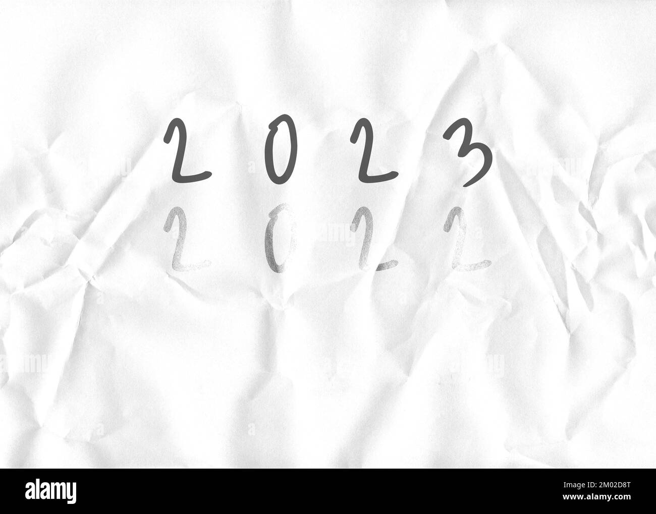 2022 - 2023 inscription on crumpled paper Stock Photo - Alamy