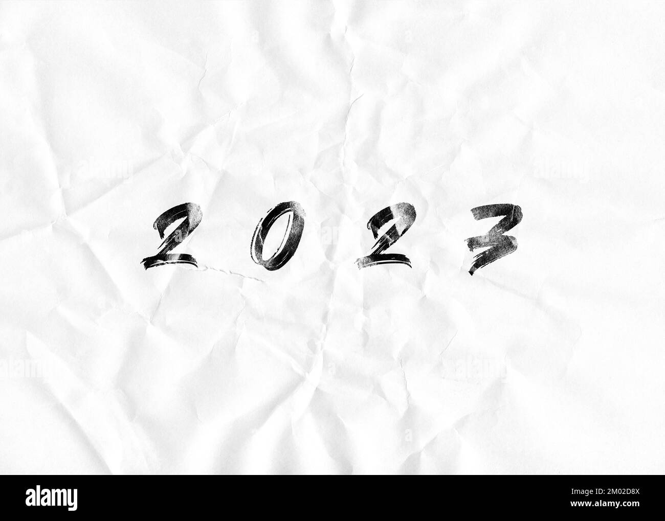 2023 inscription on crumpled paper Stock Photo - Alamy