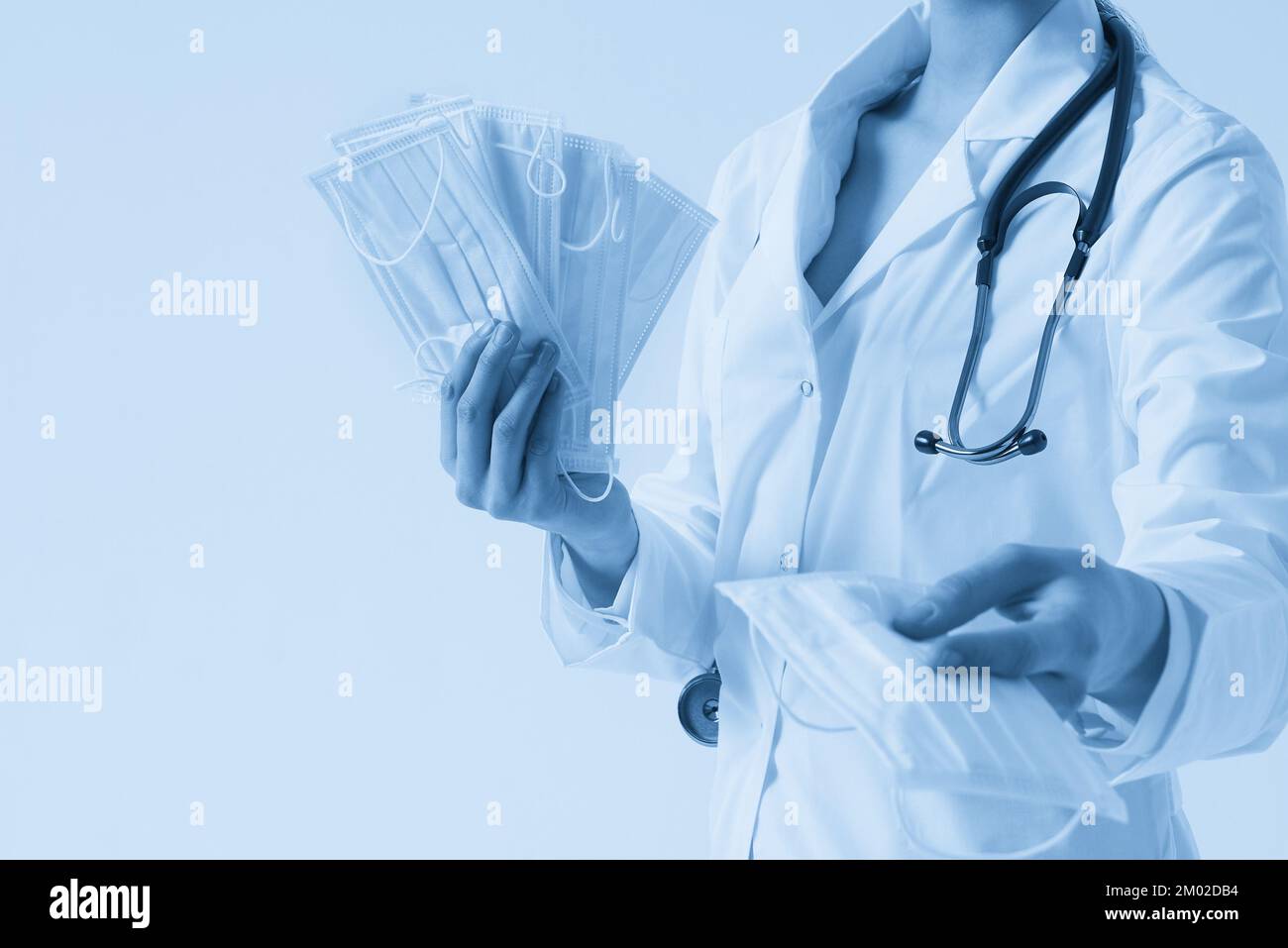 Doctor or nurse recommend to use protective face mask to protect from ...