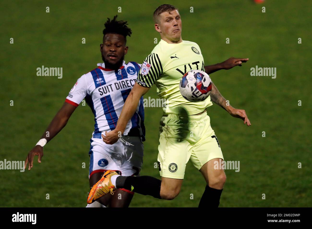 Hartlepool United's Rollin Menayese and Stockport County's Will Collar ...