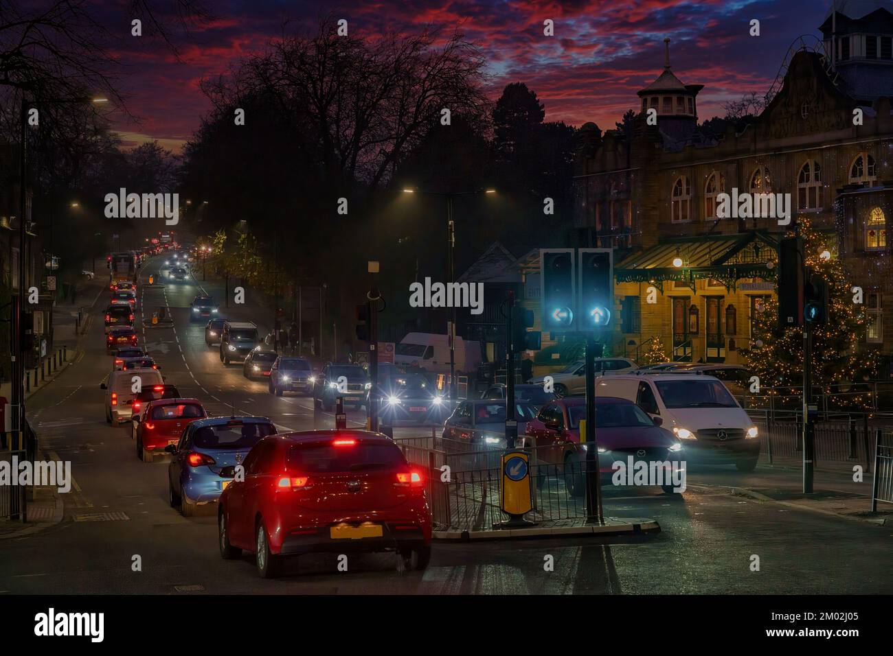 Queues of traffic alongside the Royal Hall at rush hour, Harrogate ...