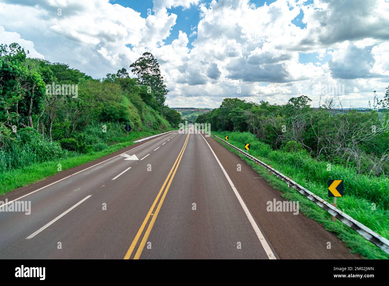 asphalt road in Brazilian nature in South America. motion blur Stock ...