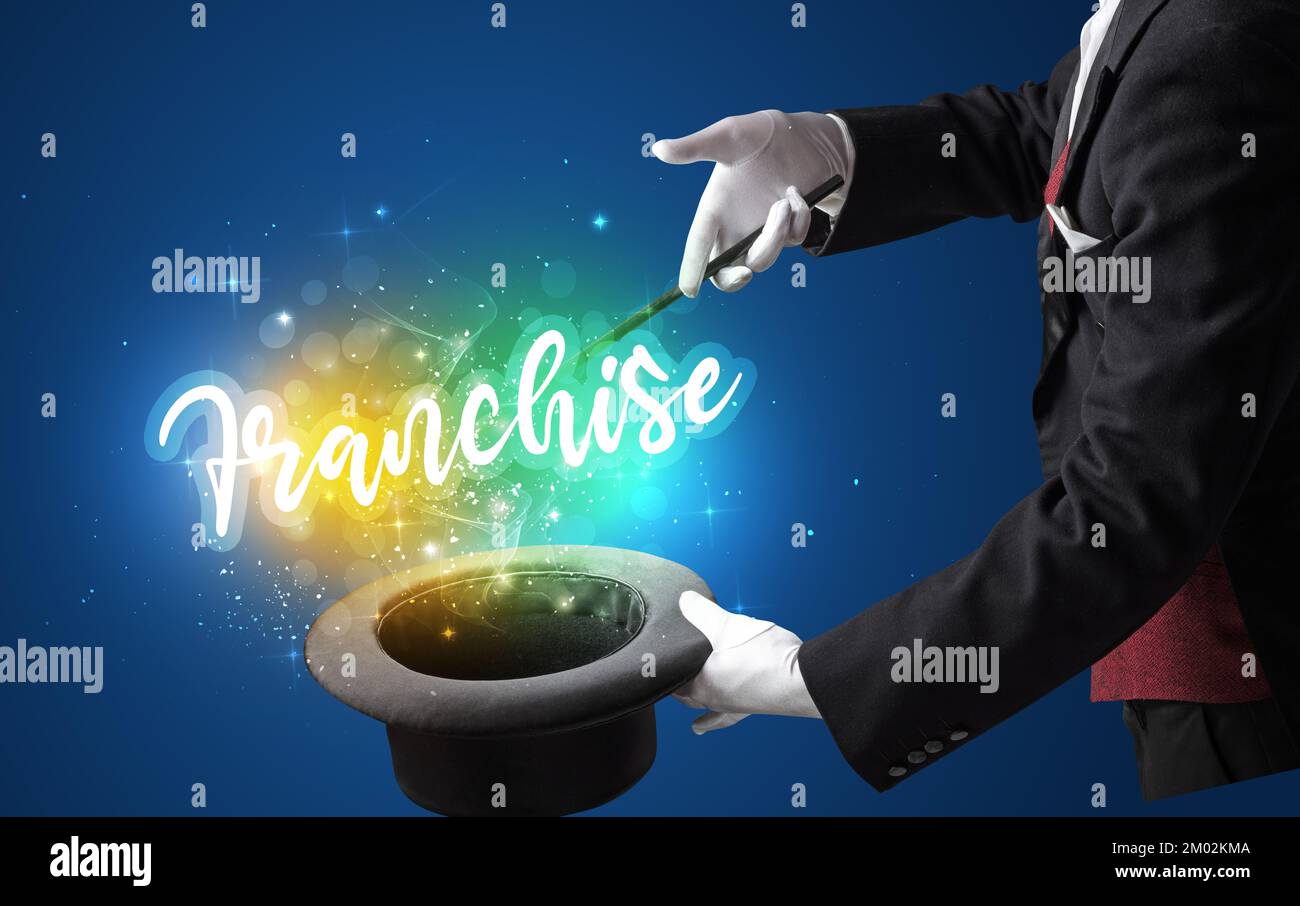 Young magician is showing magic trick Stock Photo - Alamy