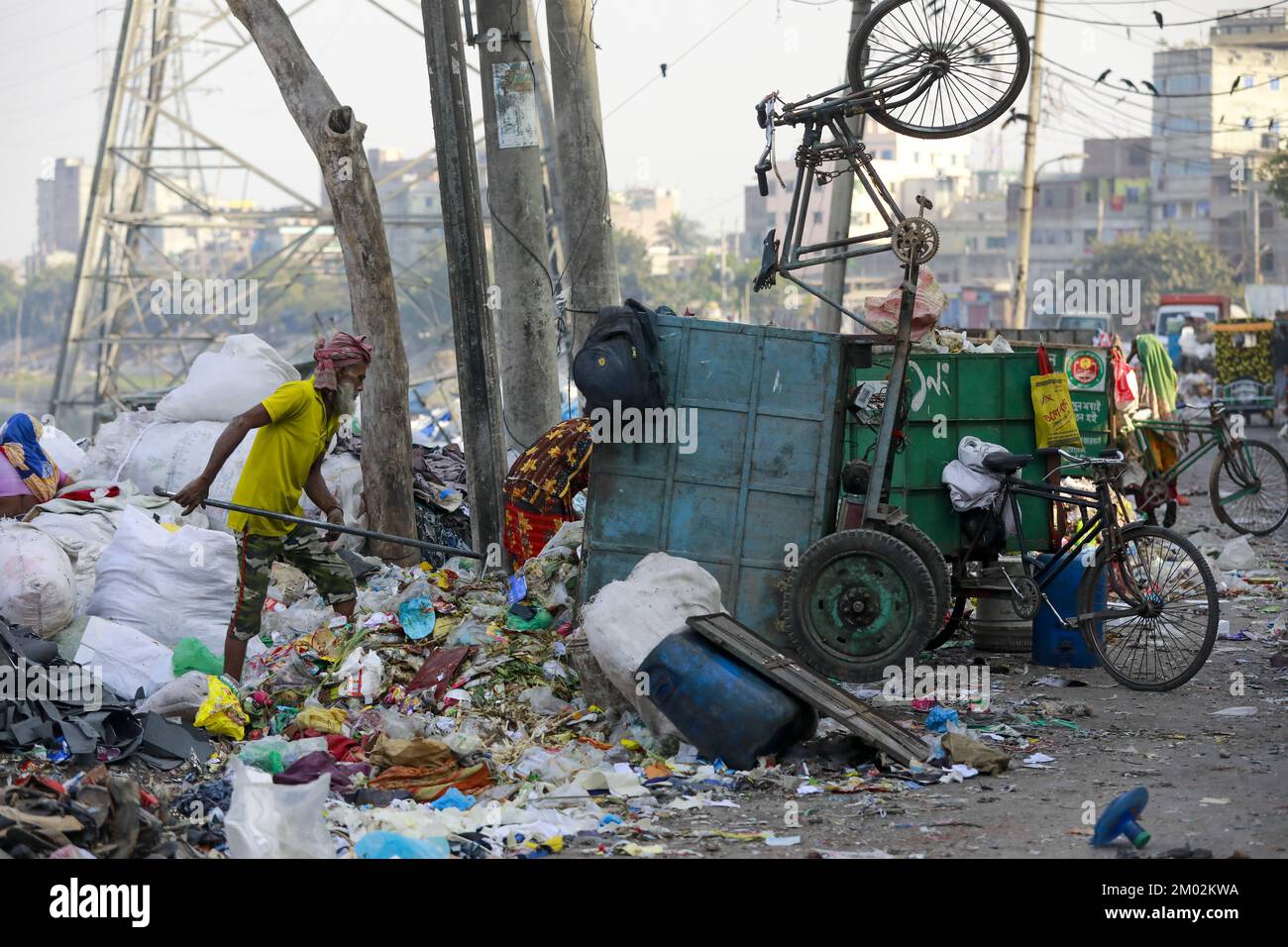 Dhaka, Bangladesh. 3rd Dec, 2022. After collecting garbage from ...