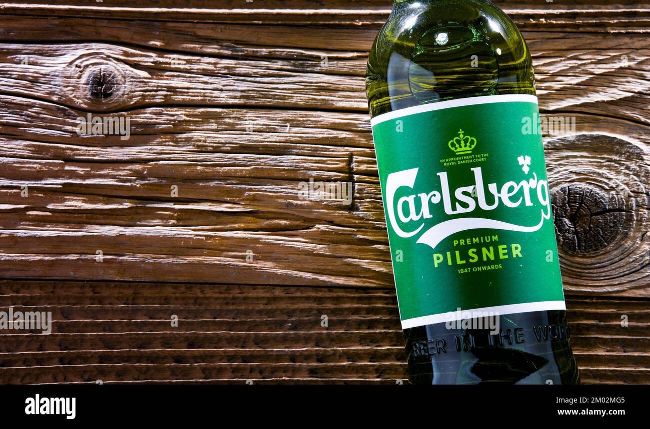 POZNAN, POL - APR 13, 2022: Bottle of Carlsberg pale lager beer ...