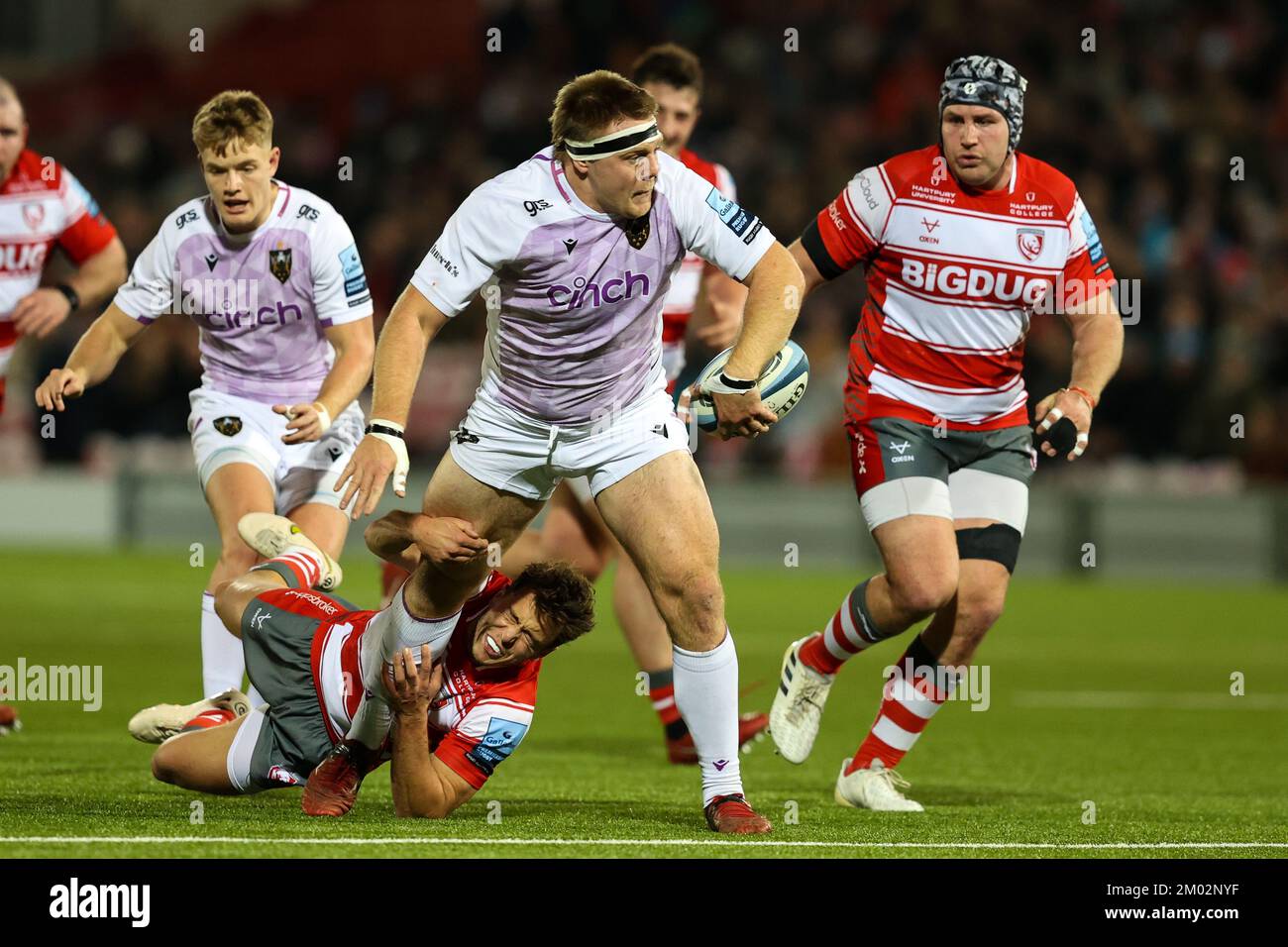 Paul Hill of Northampton Saints is tackled during the Gallagher ...