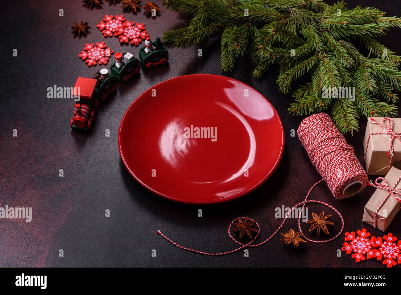 Christmas table with empty plate and surface with New Year's ...