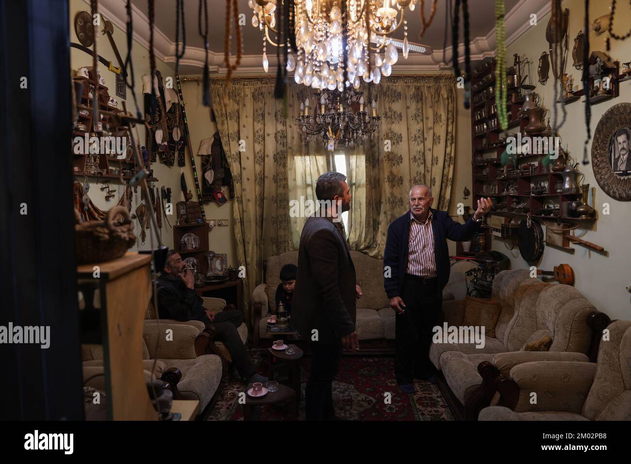 Azaz, Syria. 03rd Dec, 2022. Muhammad Dadikhi (R), a 75-year-old Syrian ...