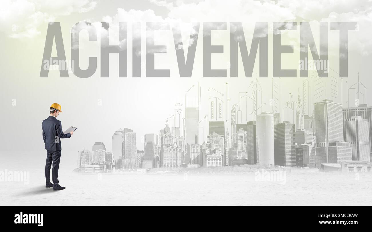 Young businessman with hard hat Stock Photo - Alamy