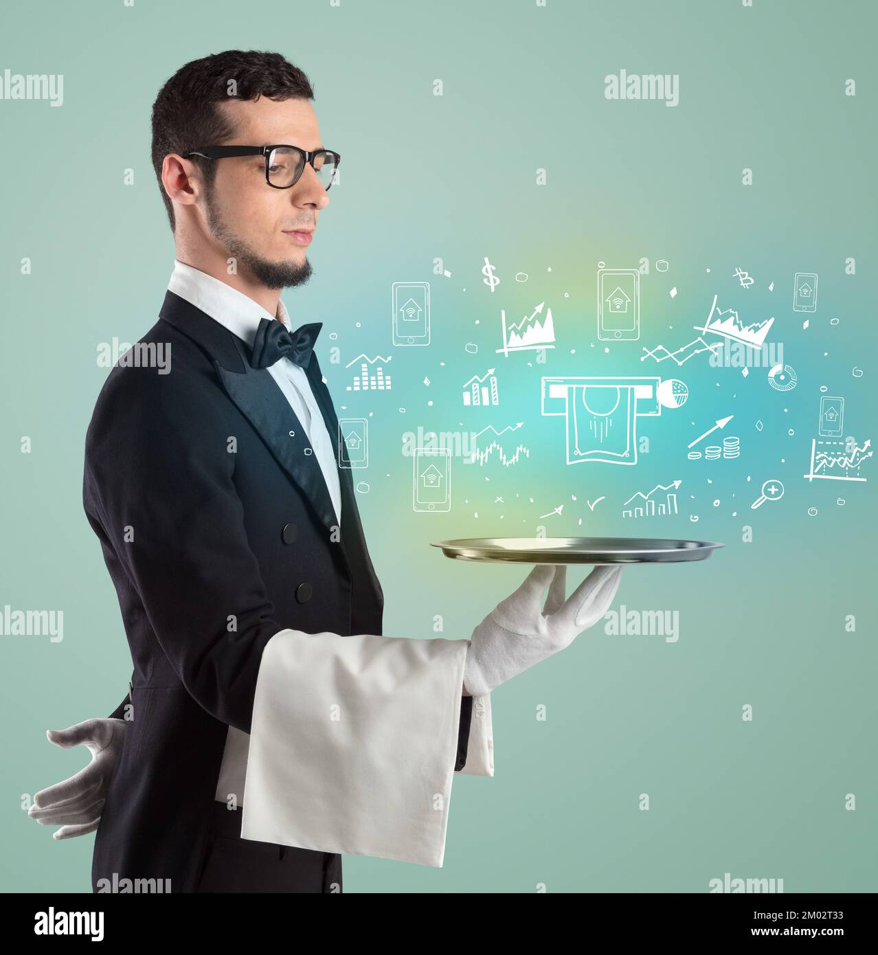 Handsome young waiter in tuxedo holding money icons on tray Stock Photo ...