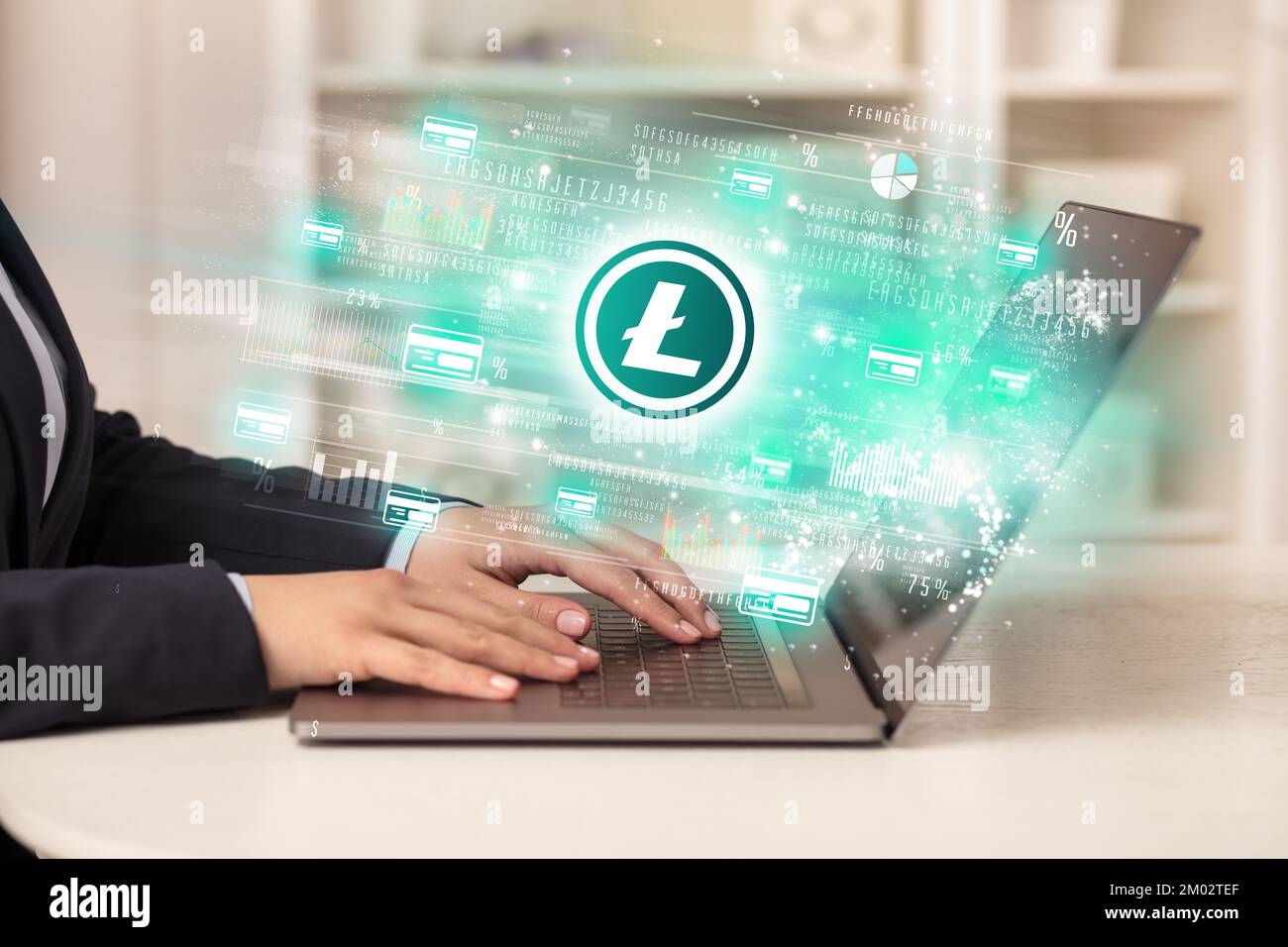 Young man watching stock market on laptop Stock Photo - Alamy