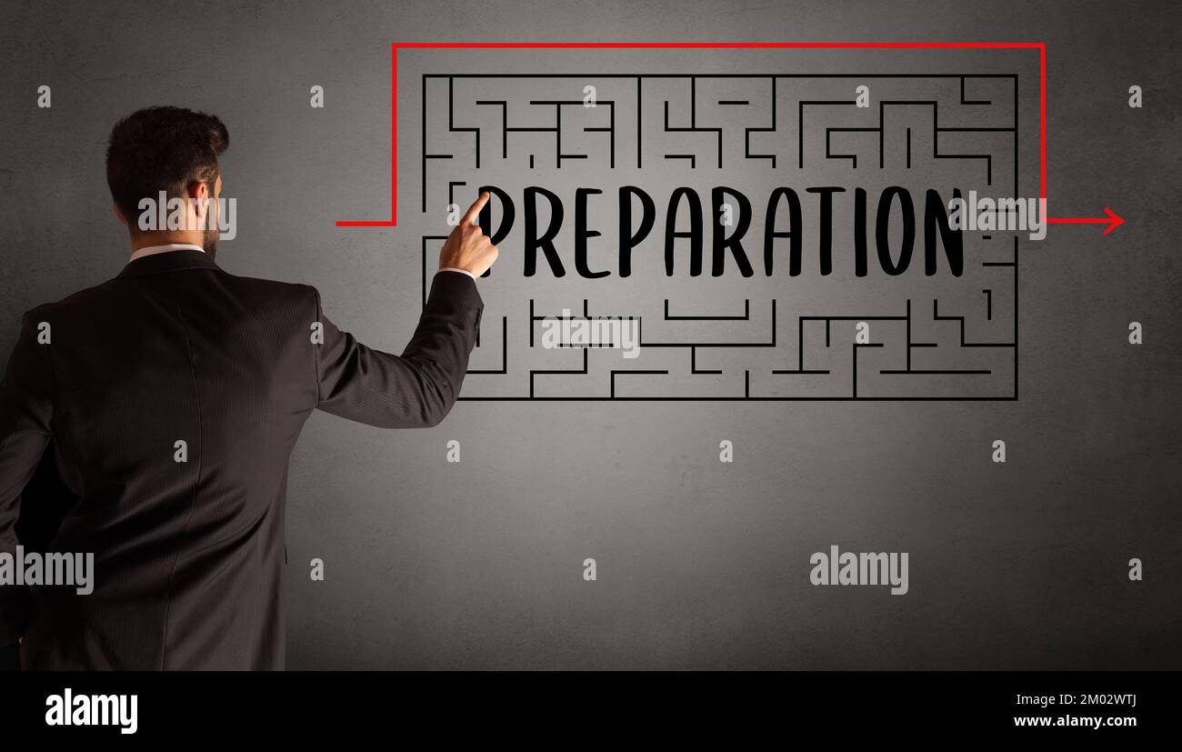 businessman drawing maze concept Stock Photo - Alamy