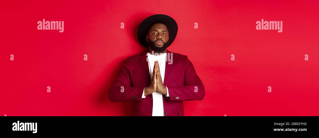 Serious african american man showing hi-res stock photography and ...