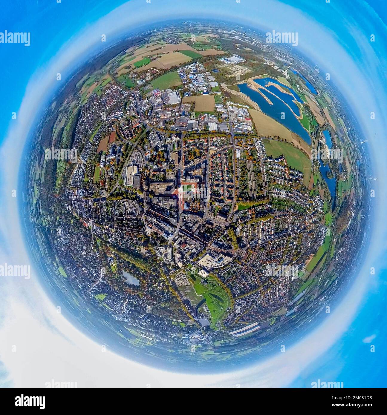 Aerial view, city center view, gravel quarry dredging lake, fisheye ...