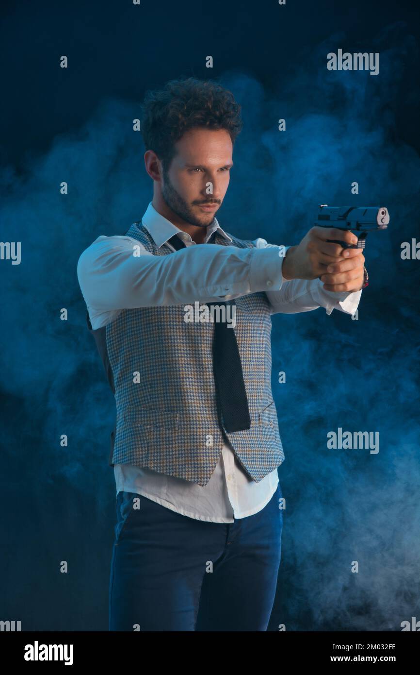 Pointing gun hi-res stock photography and images - Alamy