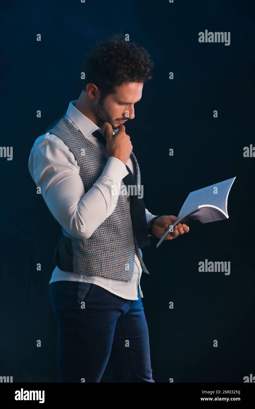 Reading while standing hi-res stock photography and images - Alamy