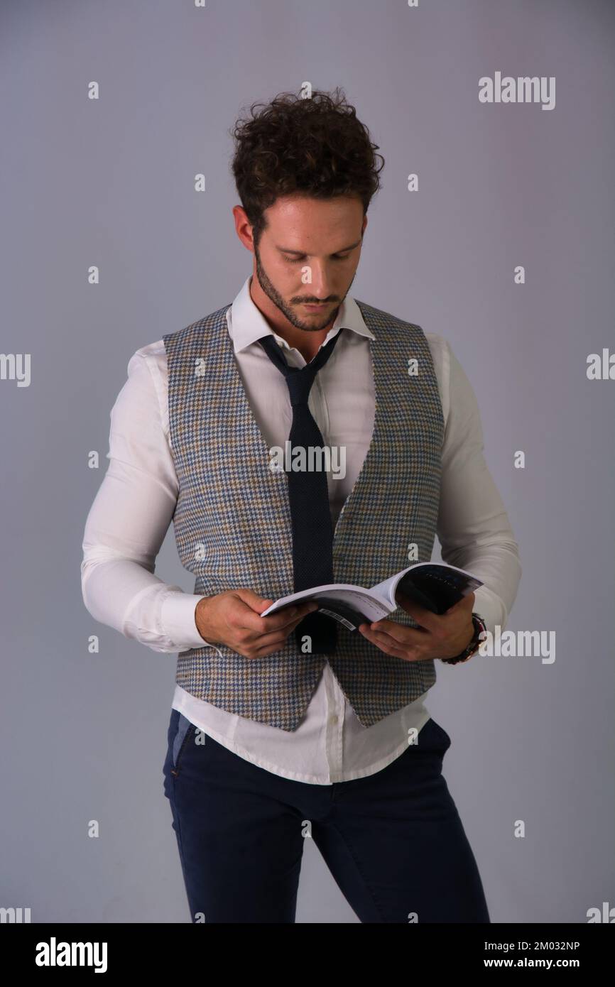Reading while standing hi-res stock photography and images - Alamy