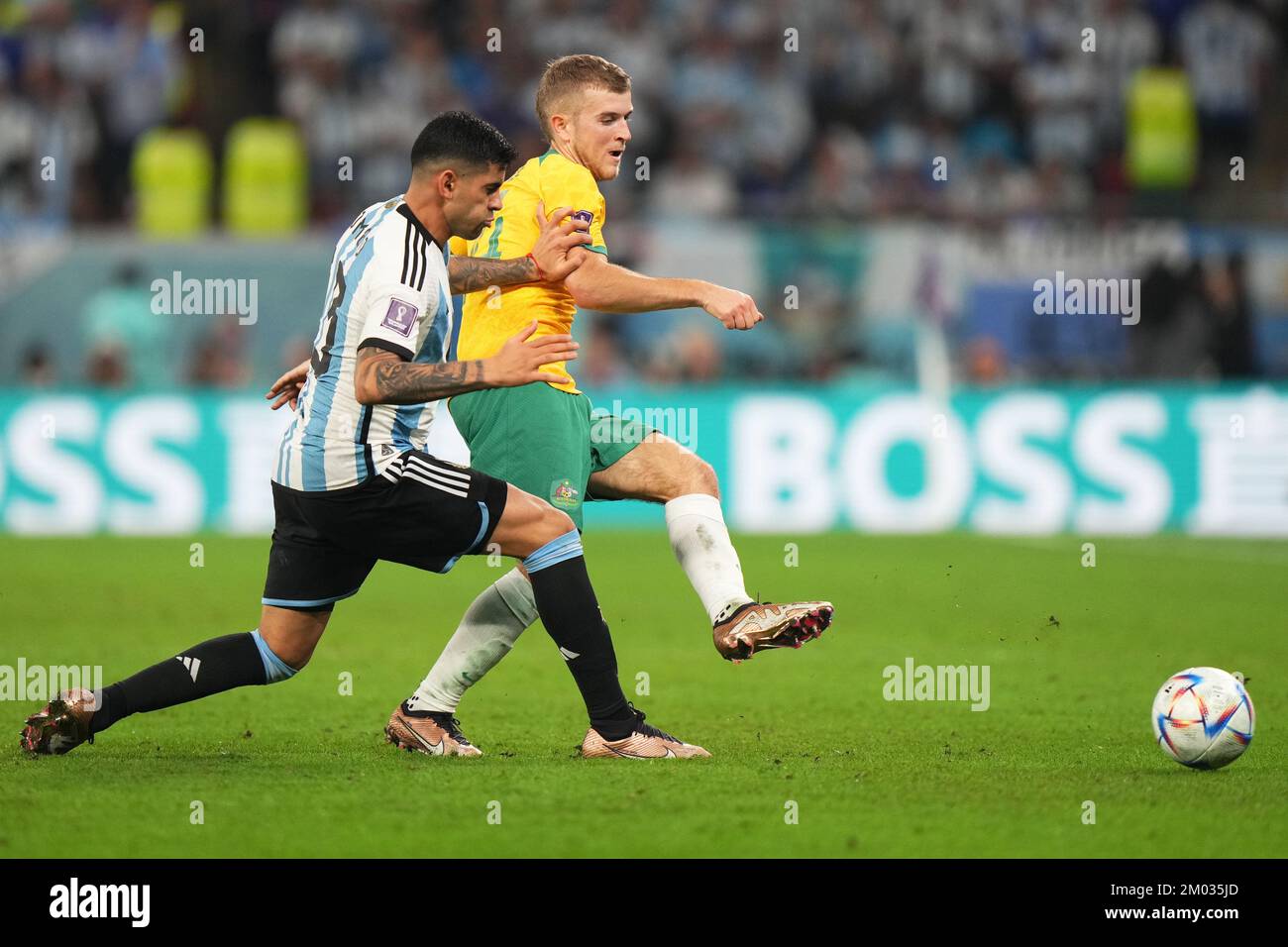 Cristian Romero of Argentina and Riley McGree of Australia during the ...